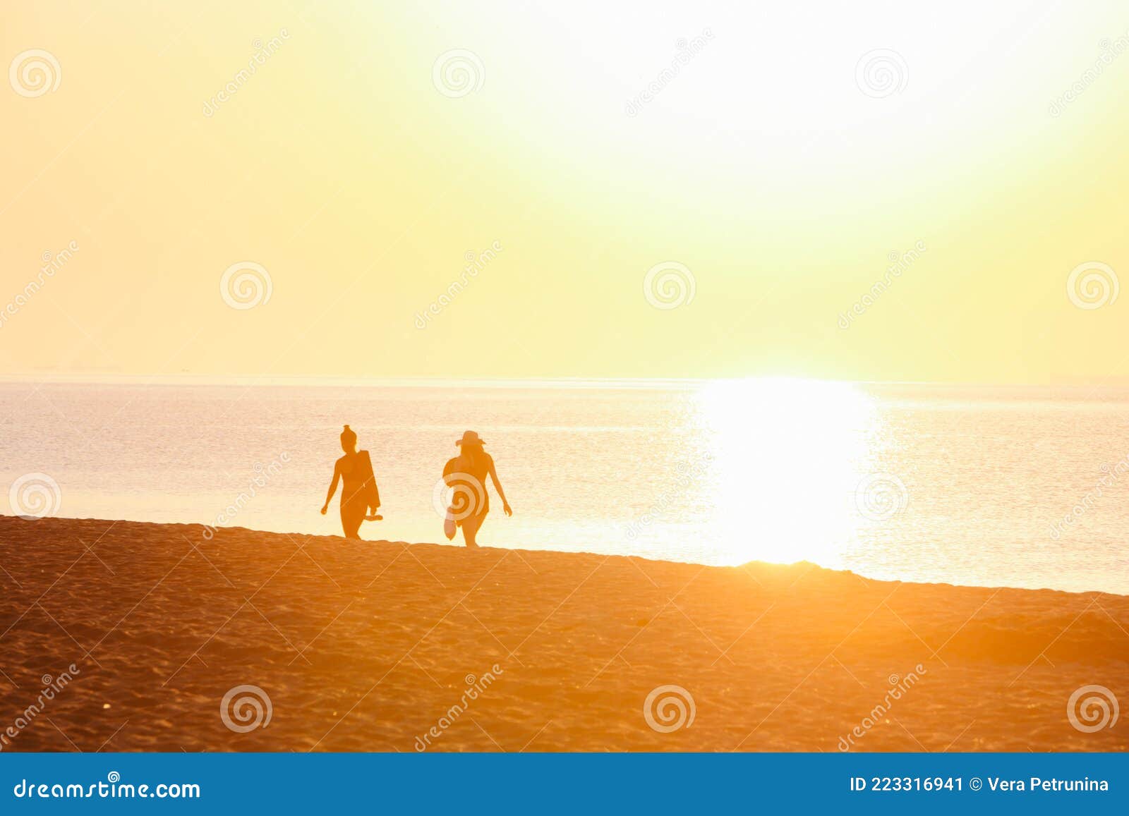 Group of Friends Walking by Sandy Beach on Sunset Stock Image - Image ...