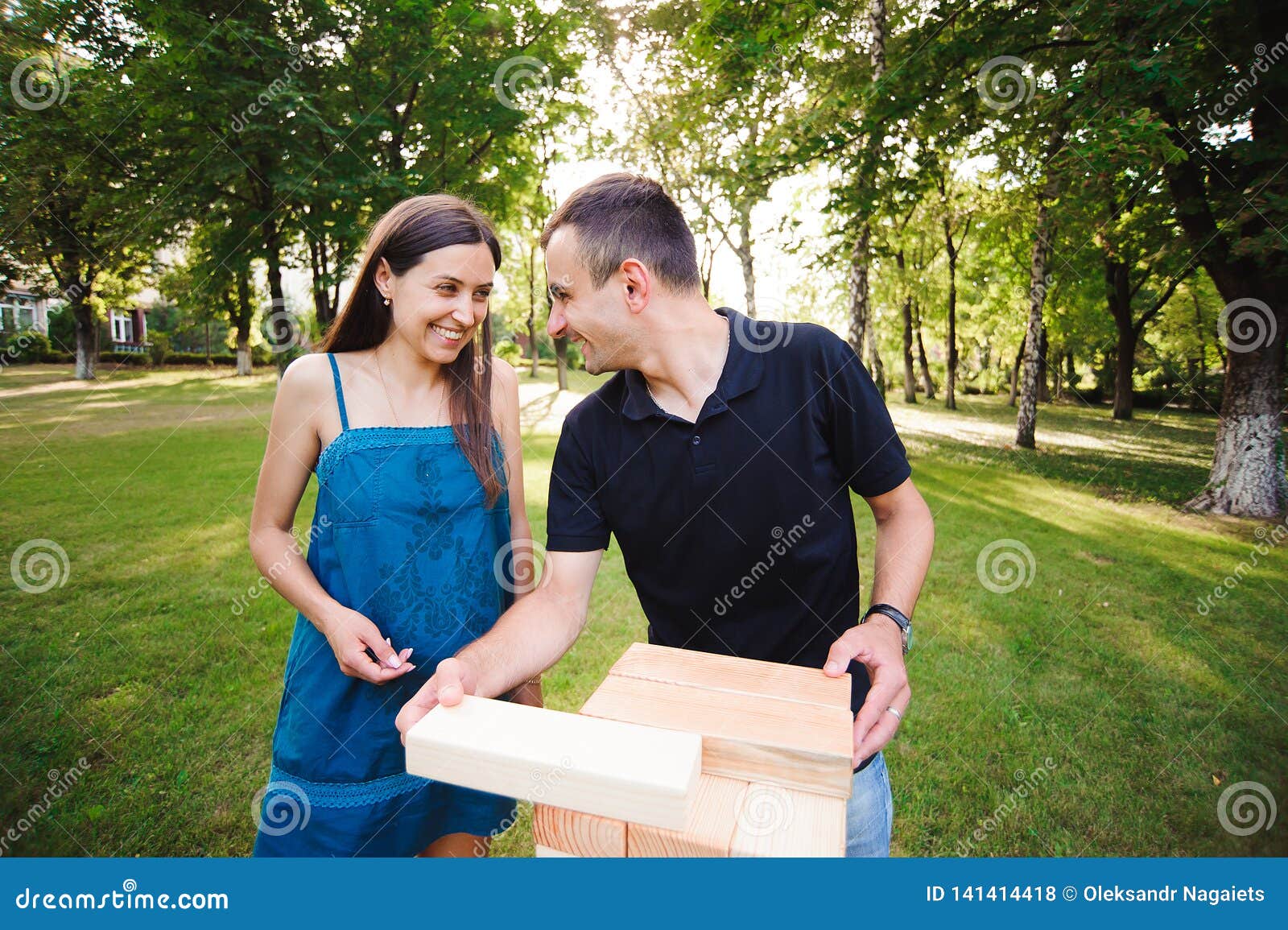 Group Game of Physical Skill with Big Blocks. Stock Photo - Image of ...