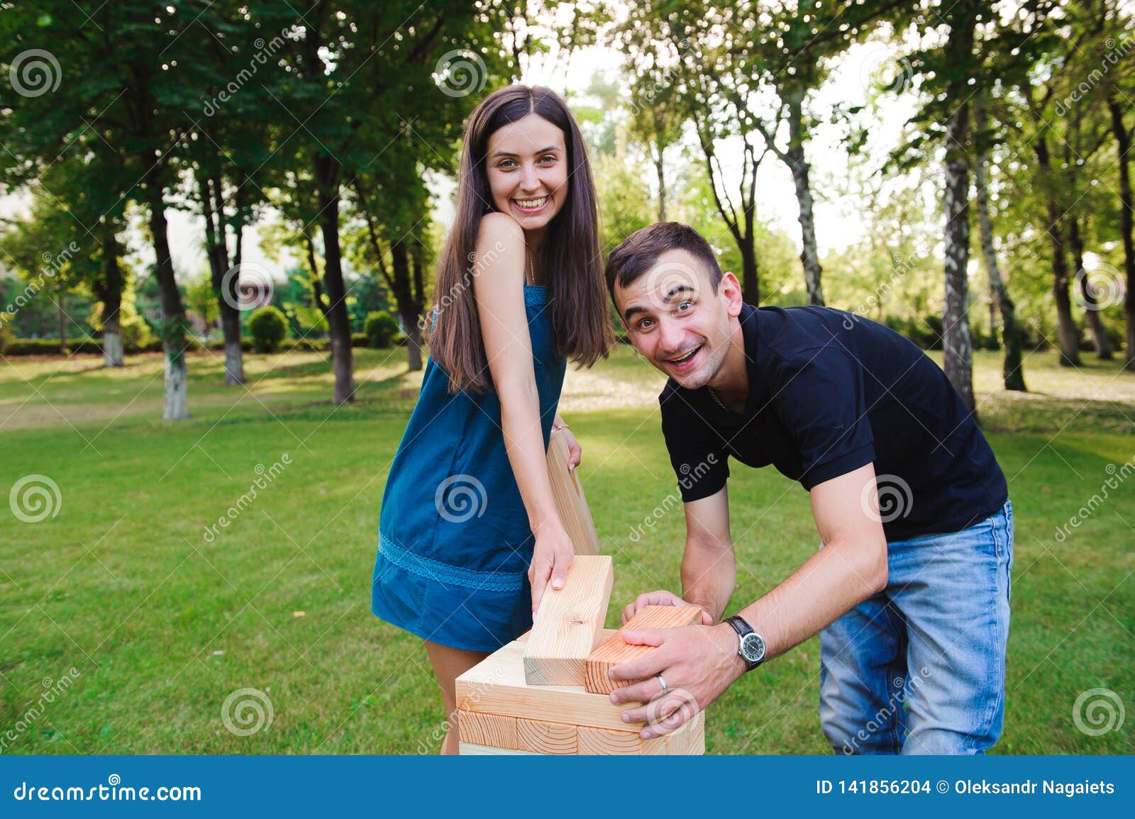 Group Game of Physical Skill with Big Blocks Stock Photo - Image of ...