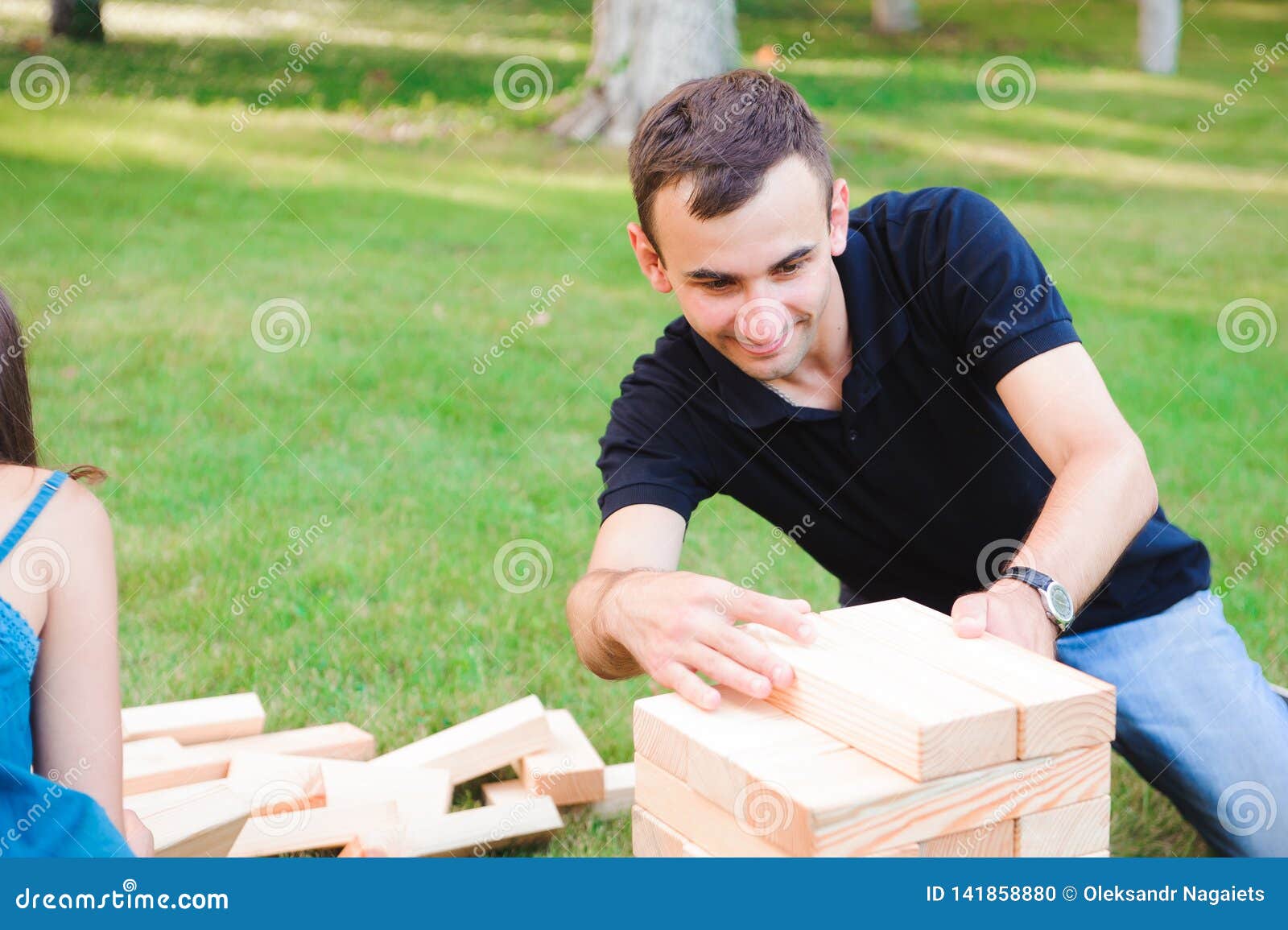 Group Game of Physical Skill with Big Blocks Stock Photo - Image of ...