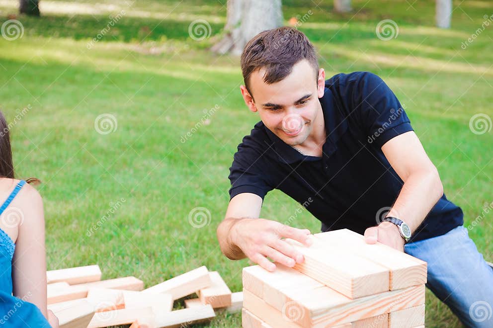 Group Game of Physical Skill with Big Blocks Stock Photo - Image of ...