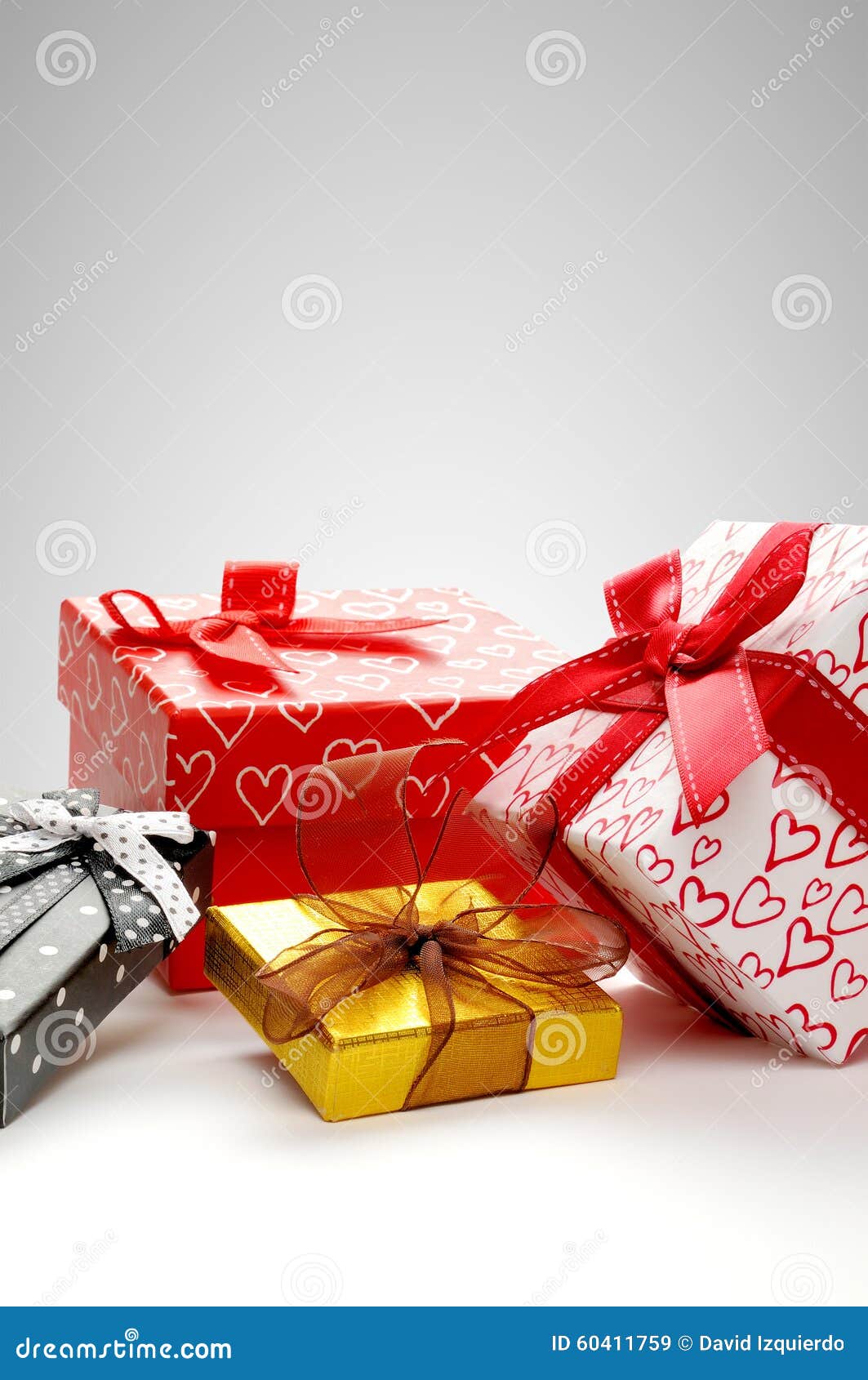 Group Gift Boxes with Bow with Grey Background Vertical Composit Stock ...