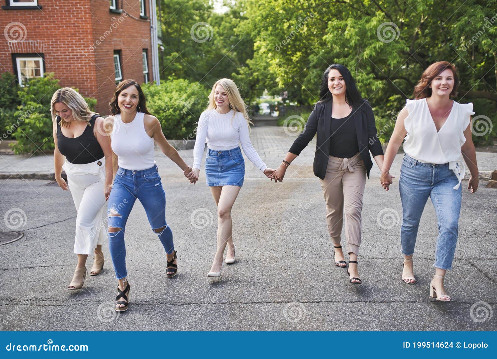 Group of Girls Friends Walking Outside Together Stock Photo - Image of ...