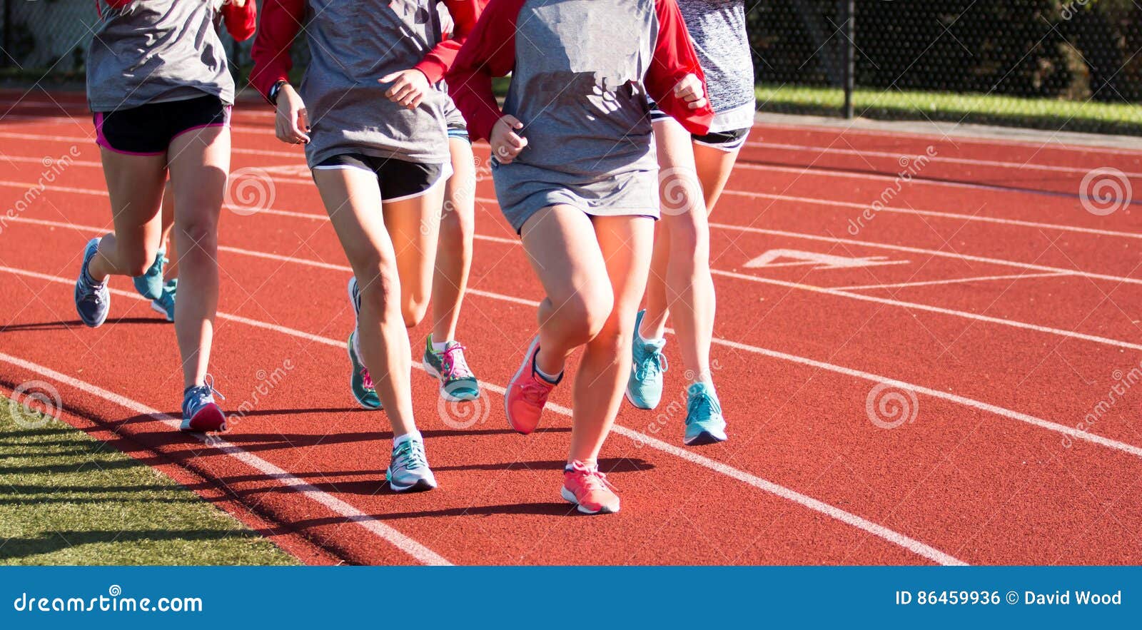 Group of Girls Training on a Red Track Stock Photo - Image of exercise ...