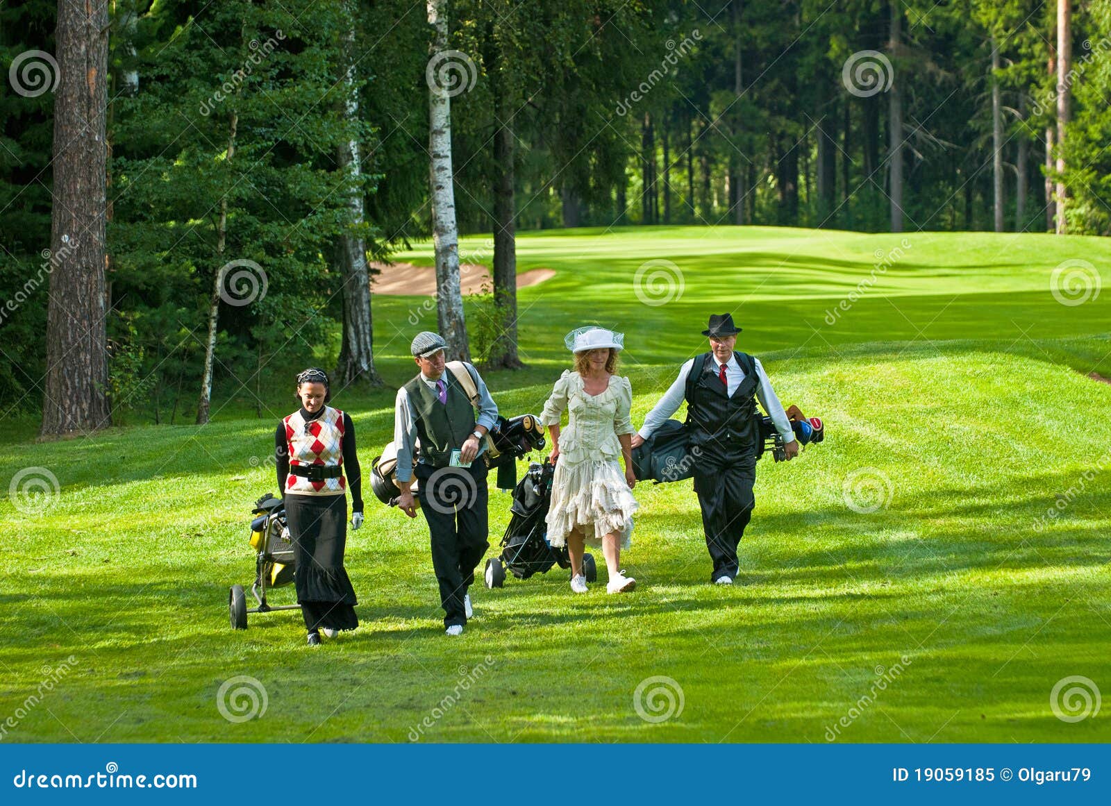 Group Of Golfers Practicing And Training Golf Swing On Driving Range ...