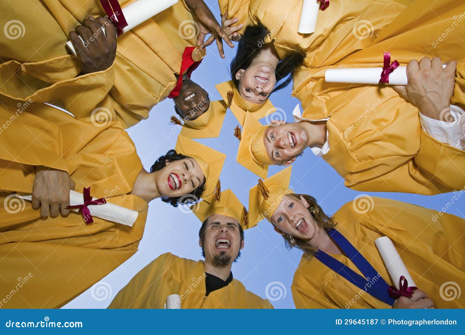 Group of Graduates Forming Huddle Stock Image - Image of education ...