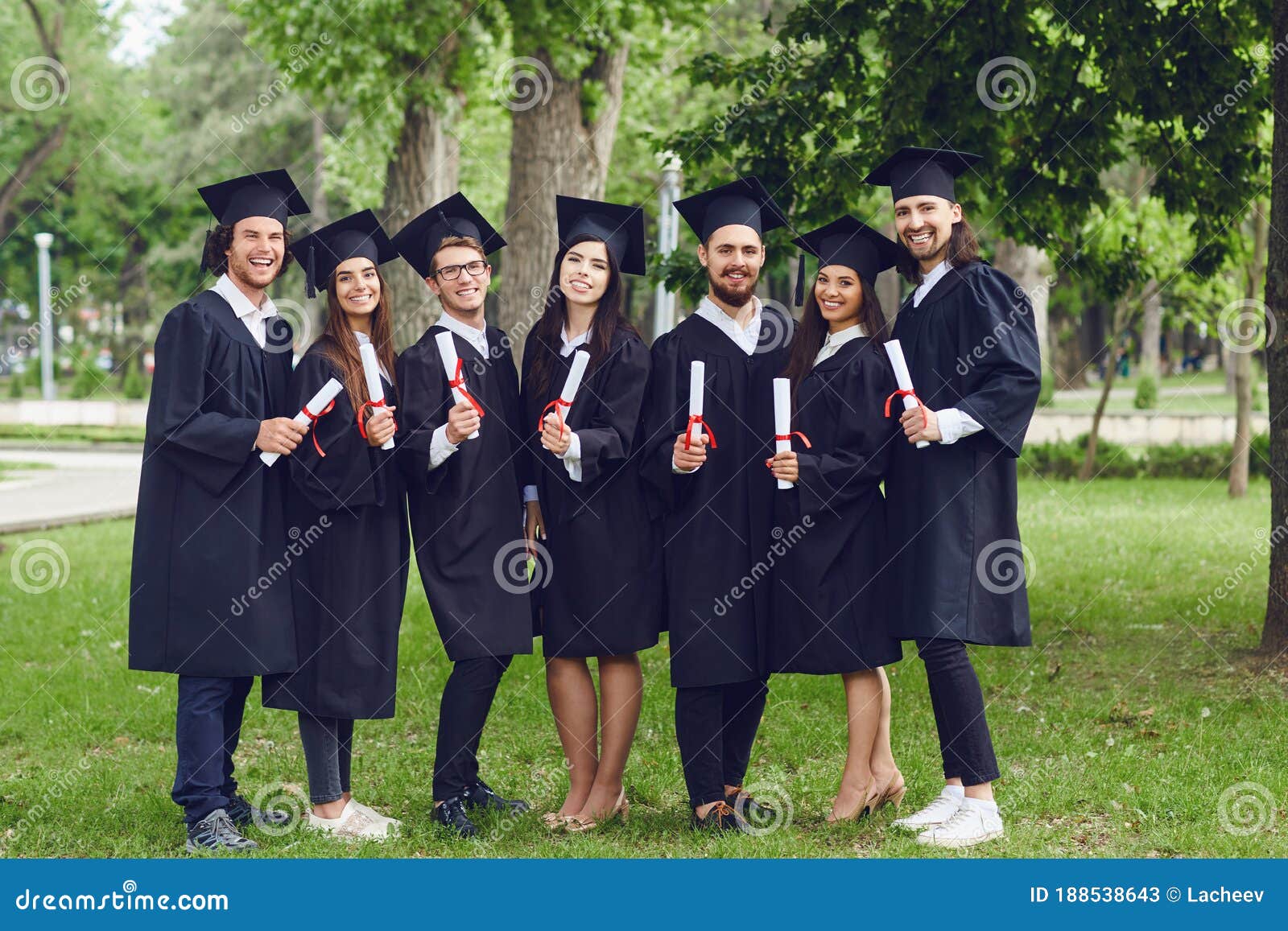 A Group of Graduates Smiling Stock Image - Image of caucasian, concept ...