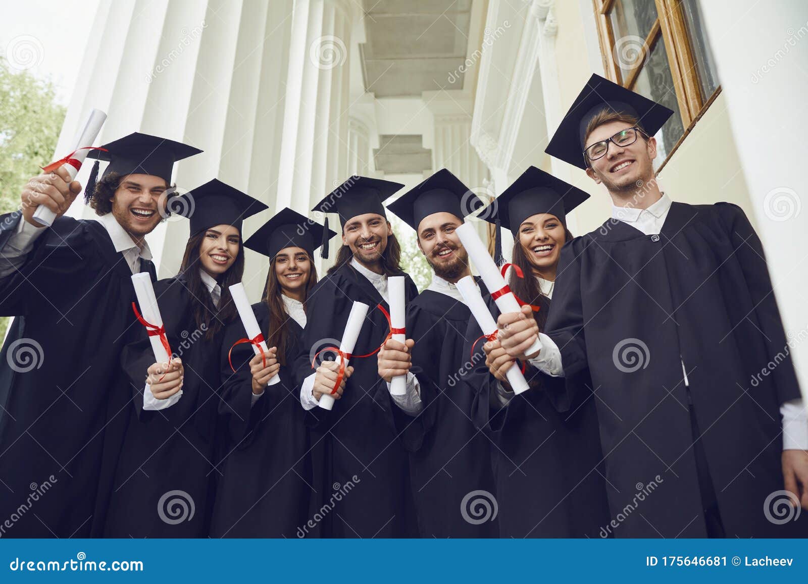 A Group of Graduates Smiling Stock Image - Image of looking, concept ...