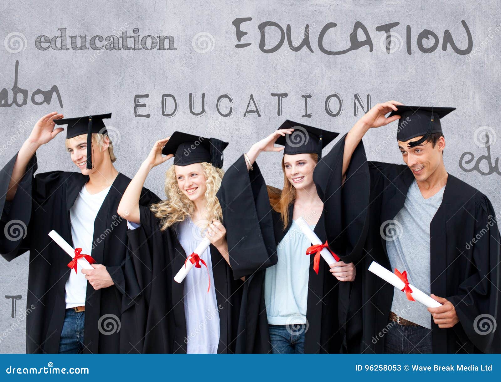 Group of Graduates Standing in Front of Education Text Stock ...