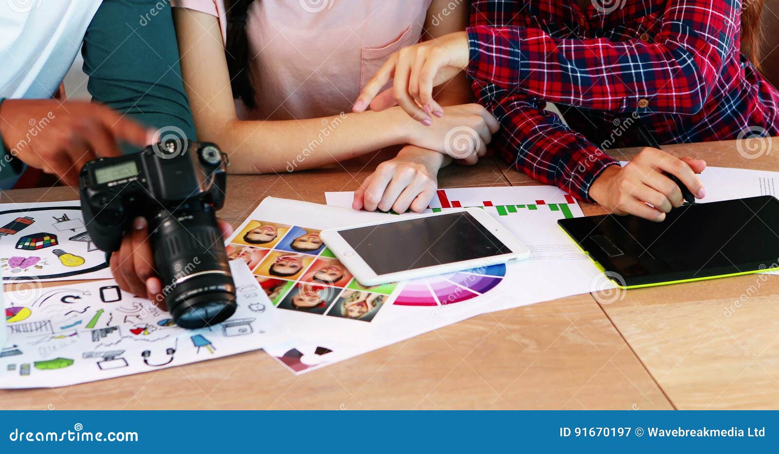 Group of Graphic Designers Working Together at Desk Stock Video - Video ...