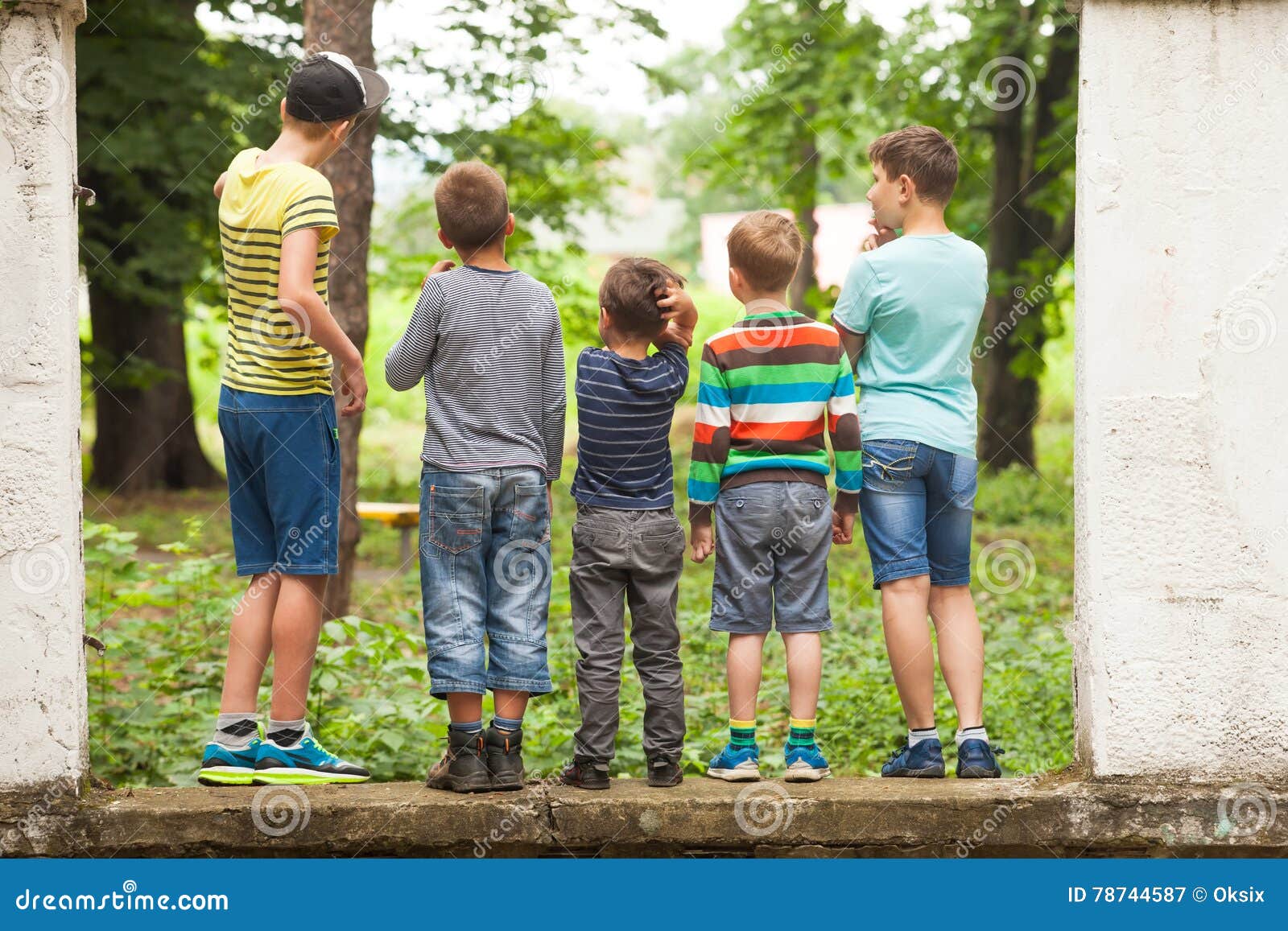 Group of Guys in a Row Back View Stock Image - Image of green, natural ...