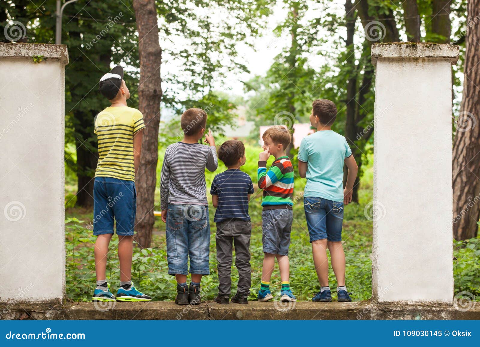 Group of Guys in a Row Back View Stock Image - Image of friendship ...