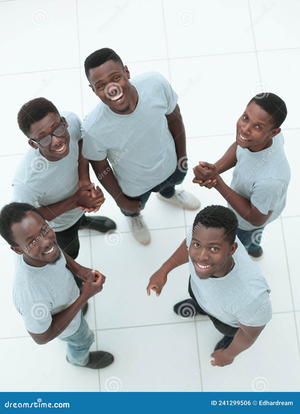 Group of Guys Standing in a Circle and Looking at the Camera Stock ...