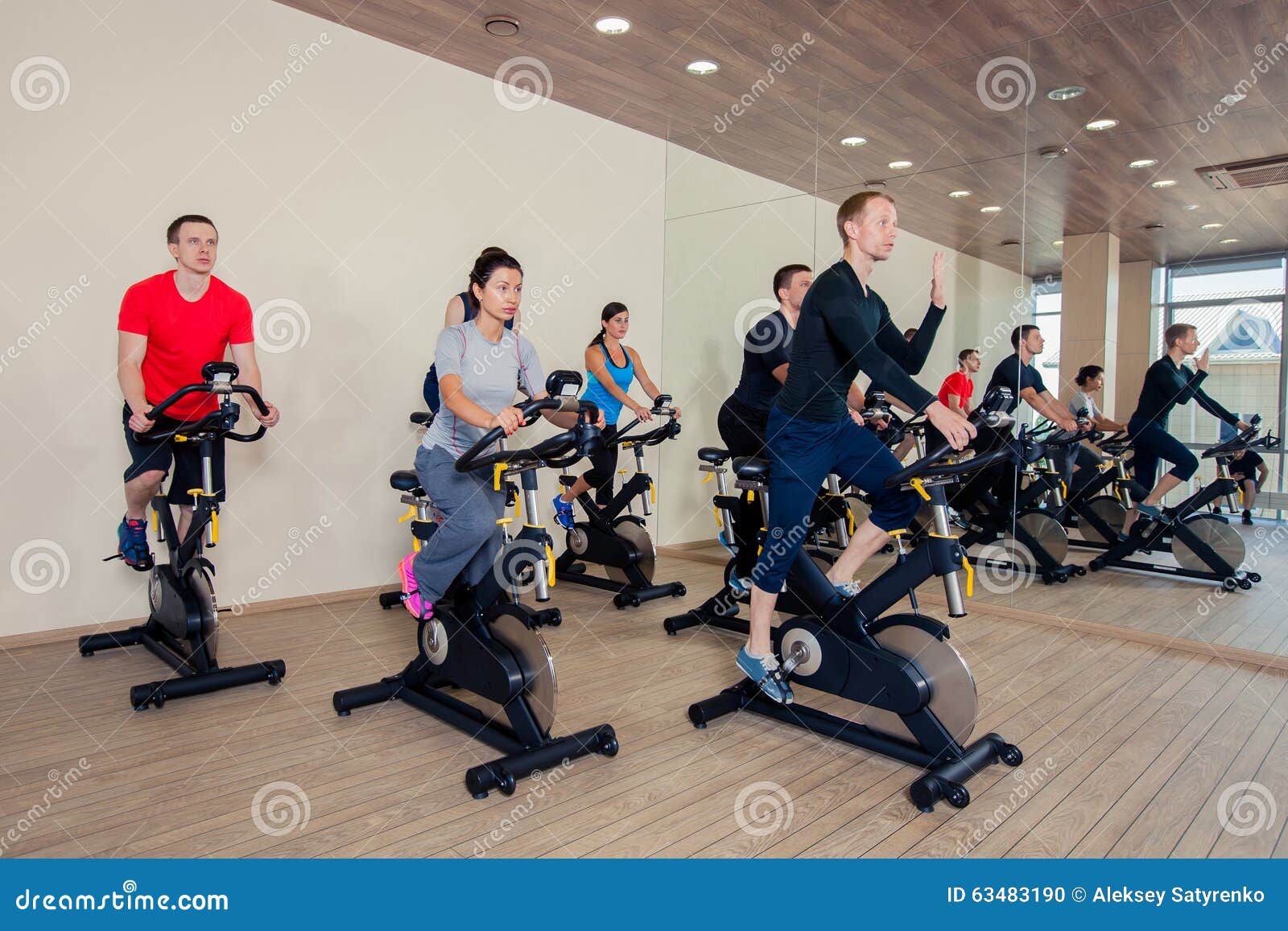 Group of Gym People on Machines, Cycling in Class Stock Photo - Image ...