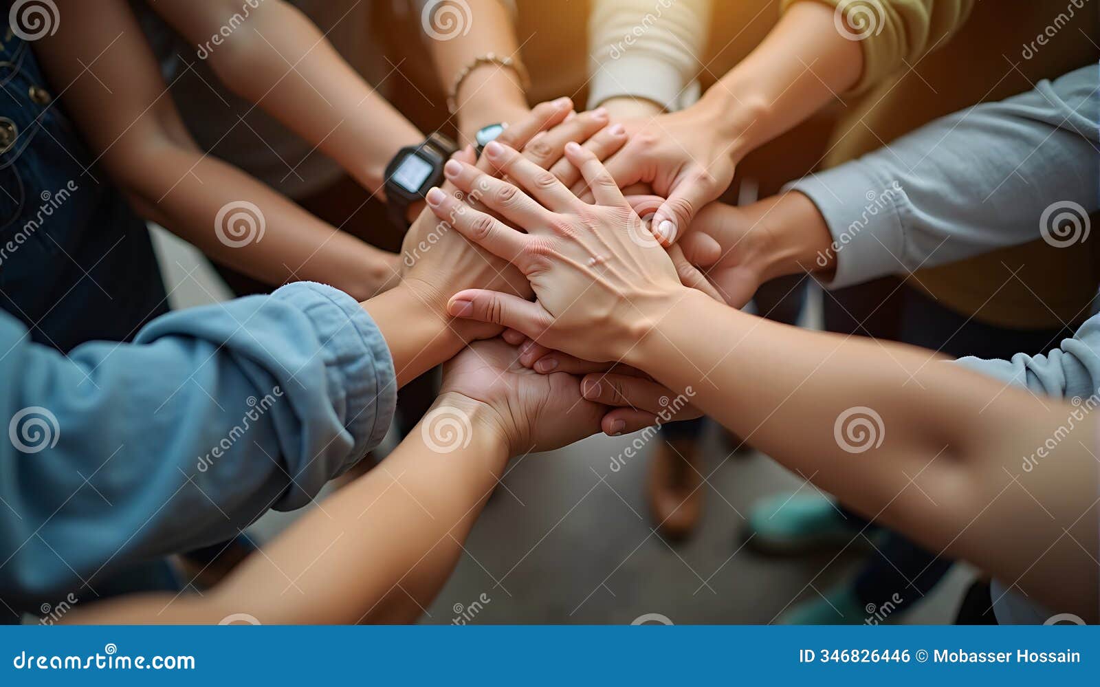 A Group of Hands Interlocked in a Circle, Symbolizing Teamwork, Unity ...