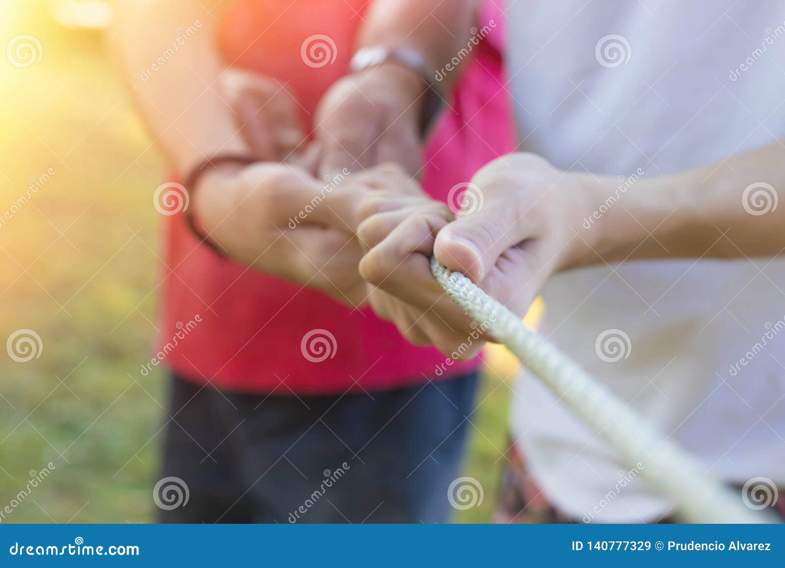 Hands pulling rope stock image. Image of comradeship - 140777329