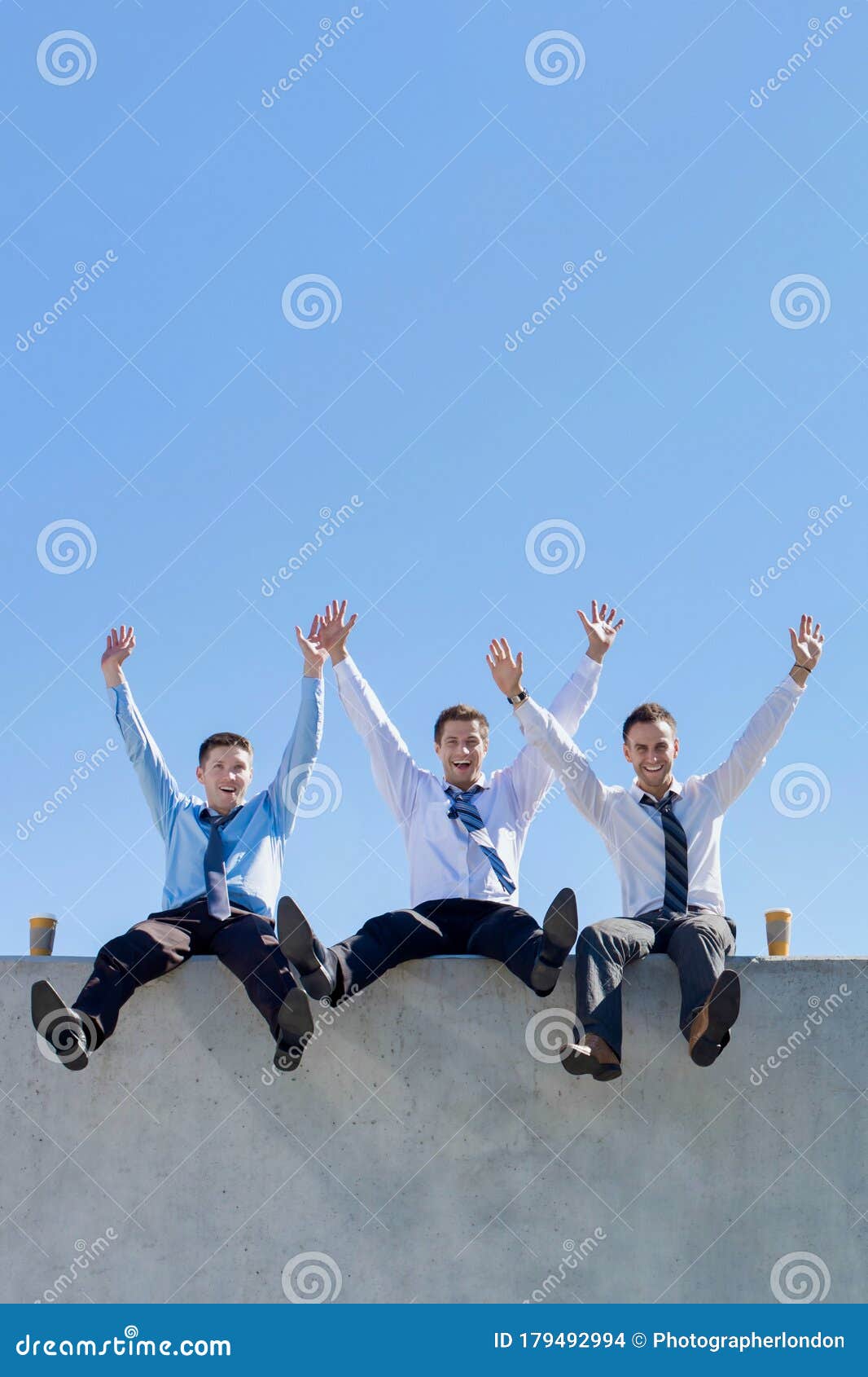 Group of Handsome Businessmen Sitting while Having Fun in Office ...
