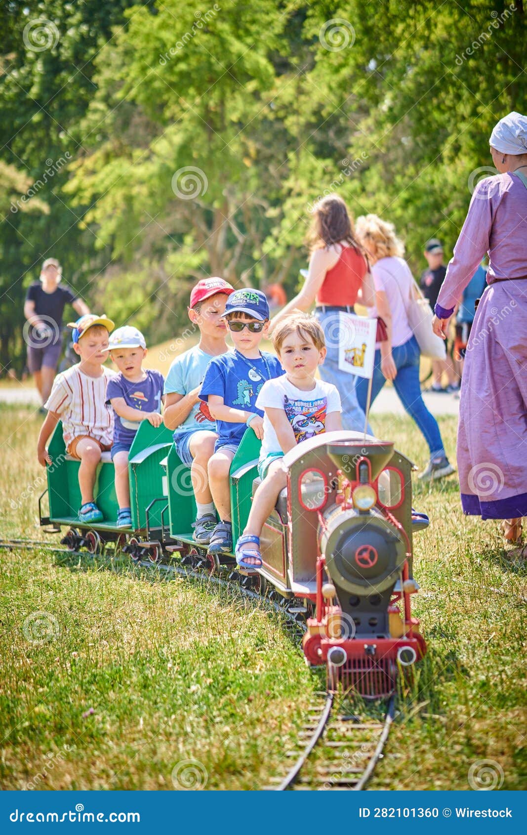 Group of Happy Children Riding on a Train in a Park in Poland Editorial ...