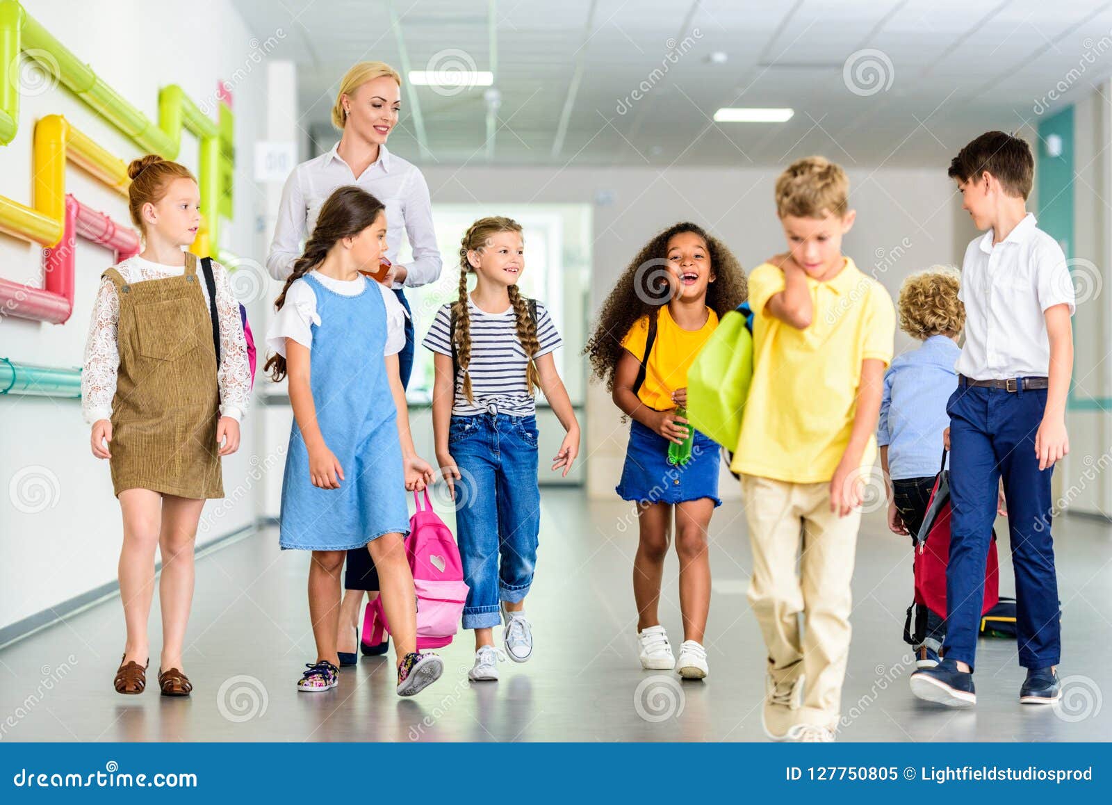 Group of Happy Classmates Walking Stock Image - Image of pupils ...