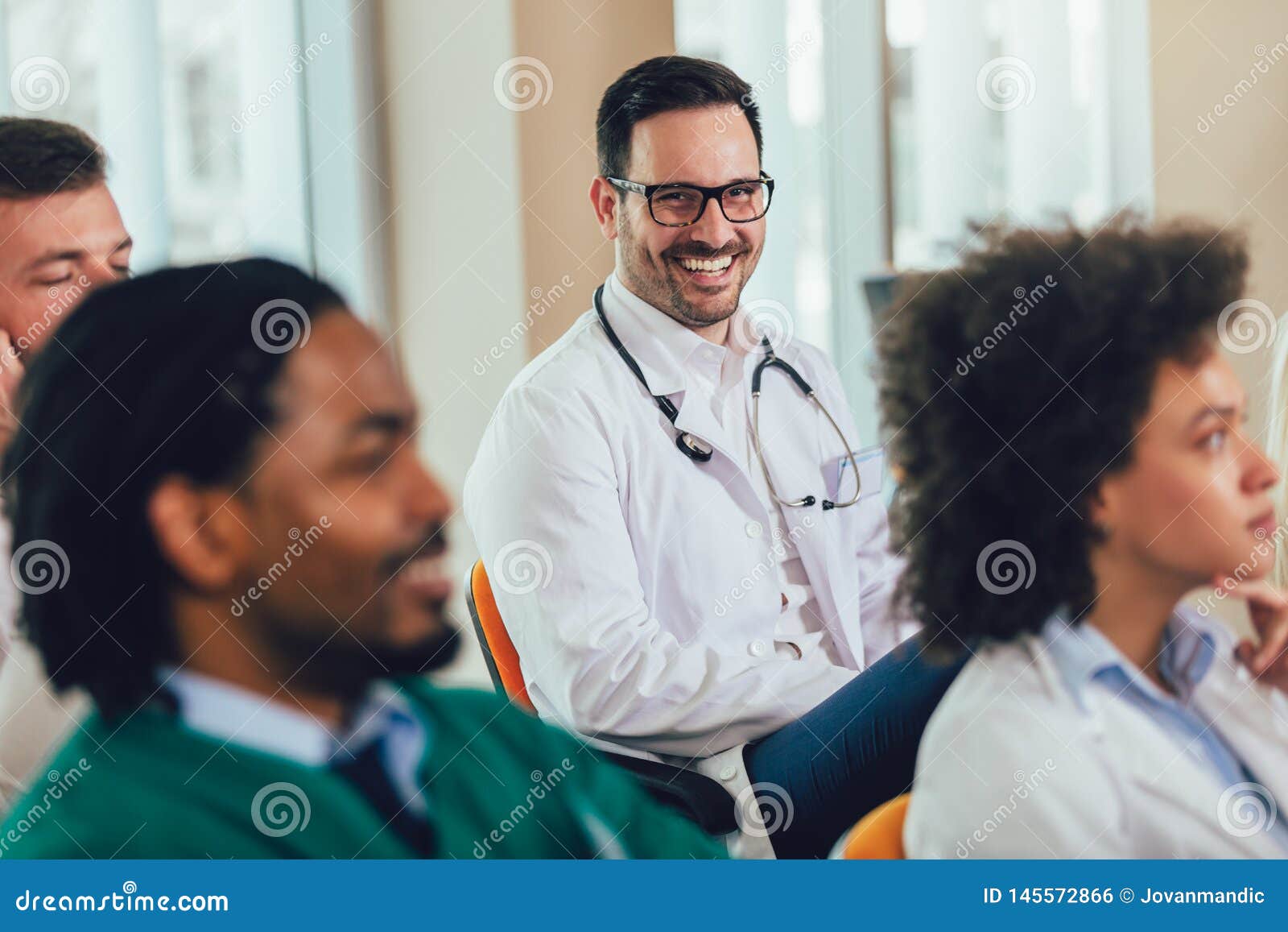 Happy Doctors on Seminar in Lecture Hall at Hospital Stock Photo ...