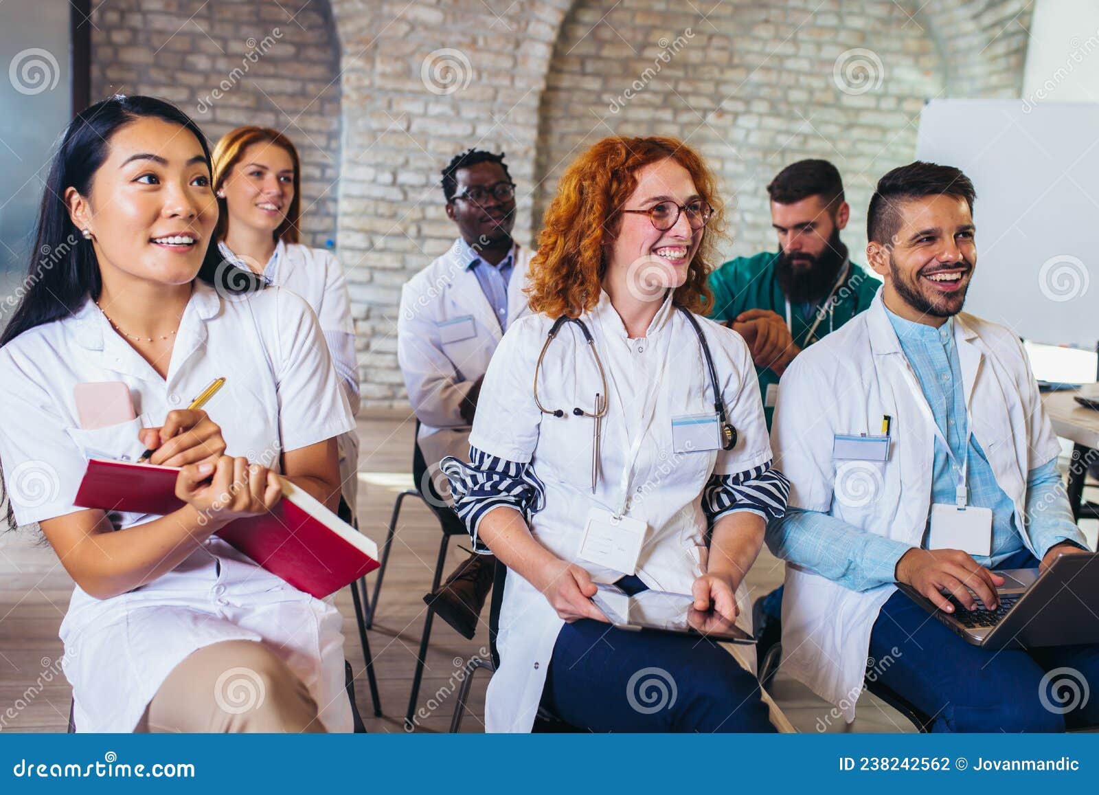 Happy Doctors on Seminar in Lecture Hall at Hospital Stock Photo ...