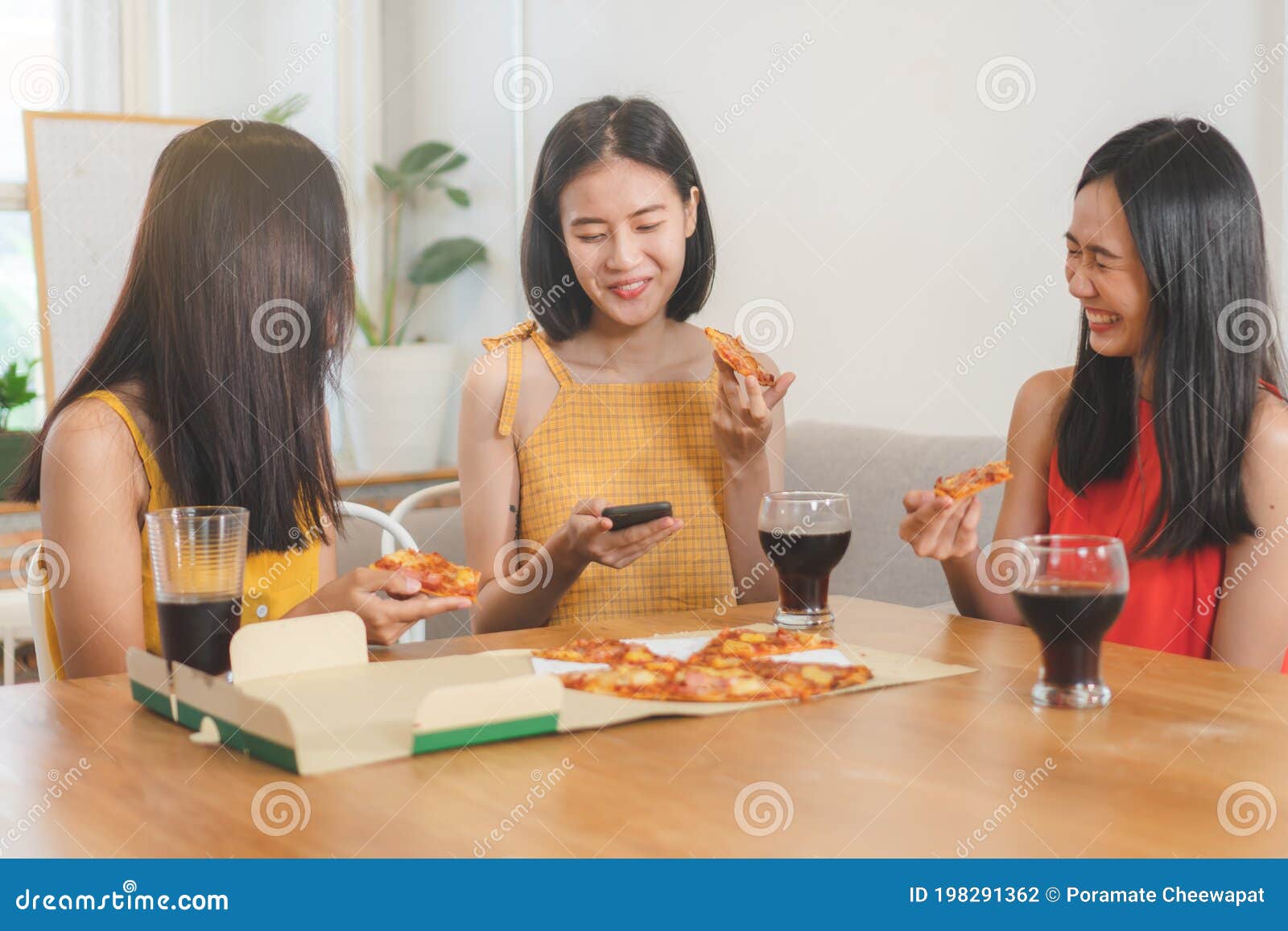 Group of Happy Friends Eating Dinner Together Stock Photo - Image of ...