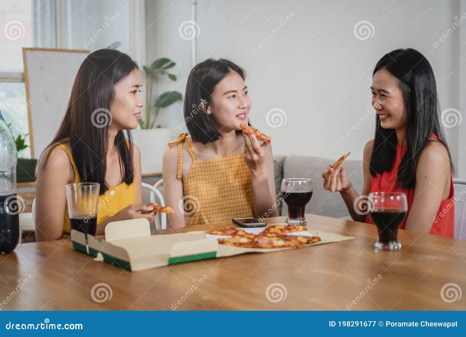 Group of Happy Friends Eating Dinner Together Stock Image - Image of ...