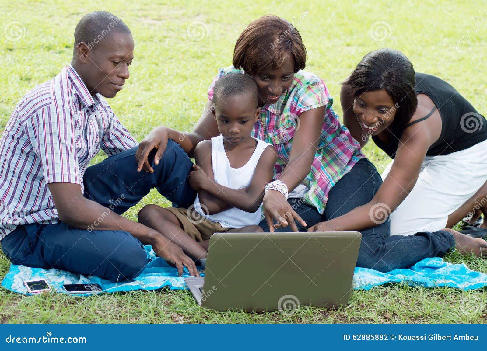 Group of Happy Friends in Front of a Laptop. Stock Photo - Image of ...