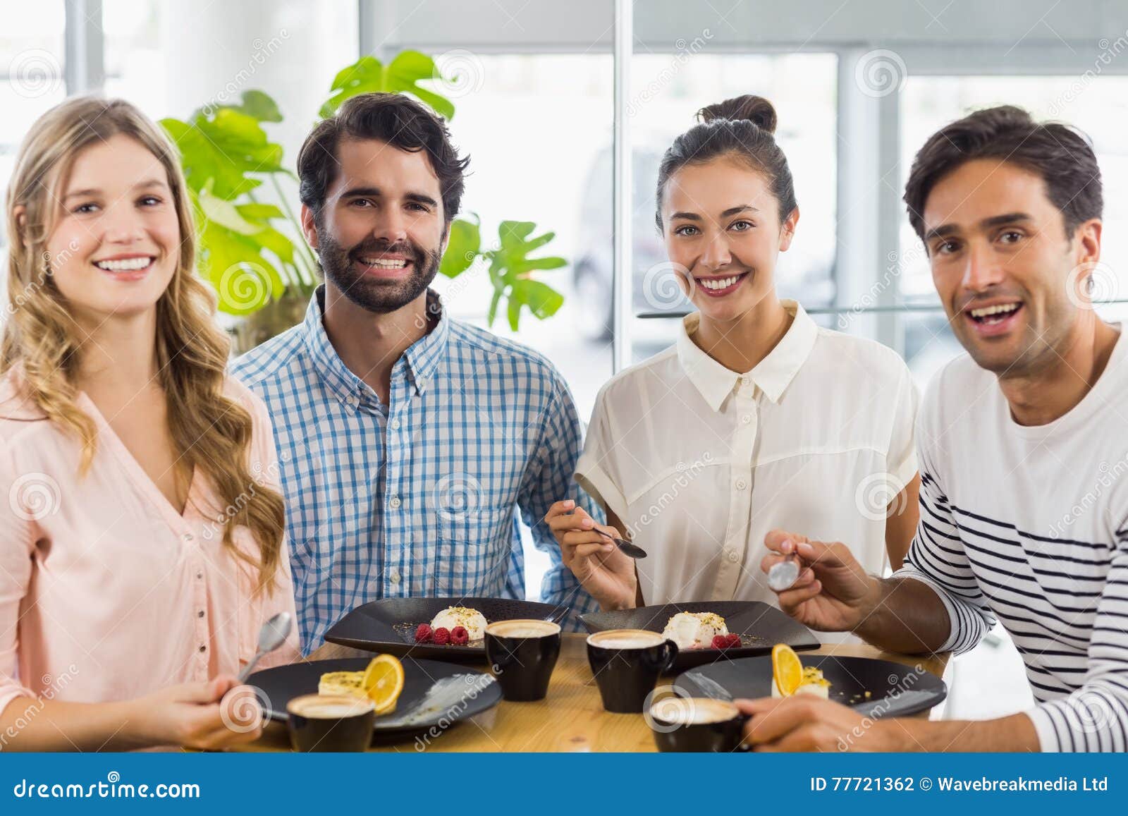 Group of Happy Friends Having Dessert Together Stock Photo - Image of ...