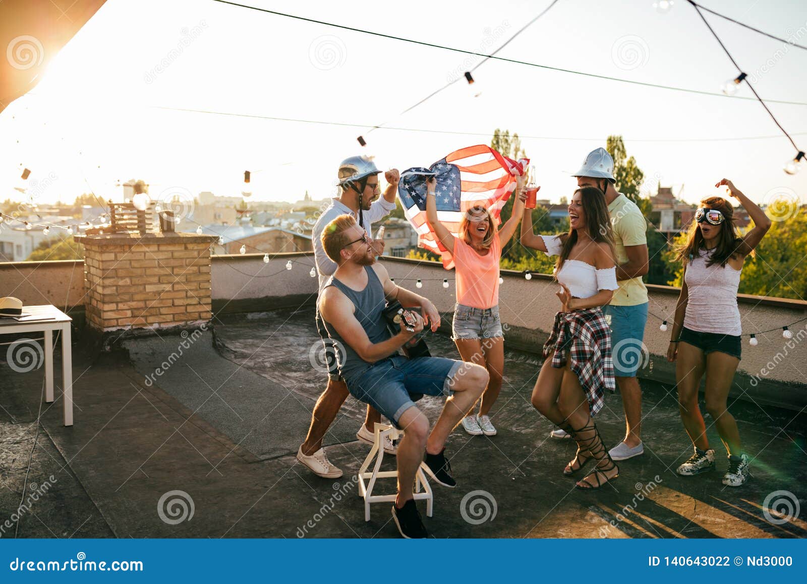 Group of Happy Friends Having Party on Rooftop Stock Photo - Image of ...