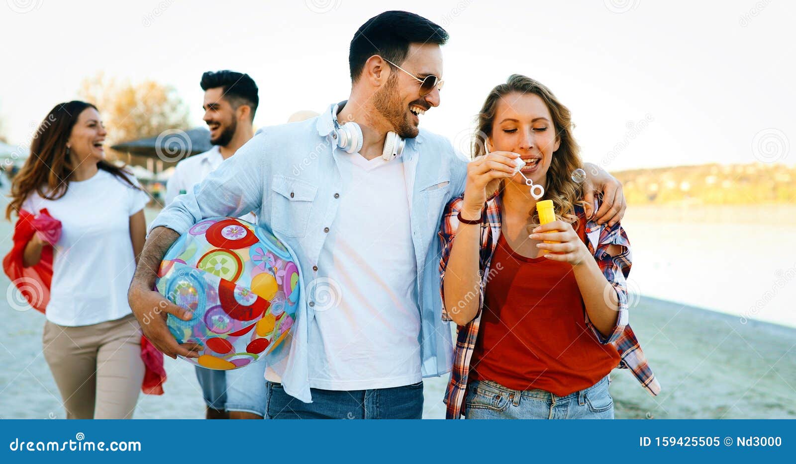 Group of Happy Friends Partying on Beach Stock Image - Image of ...