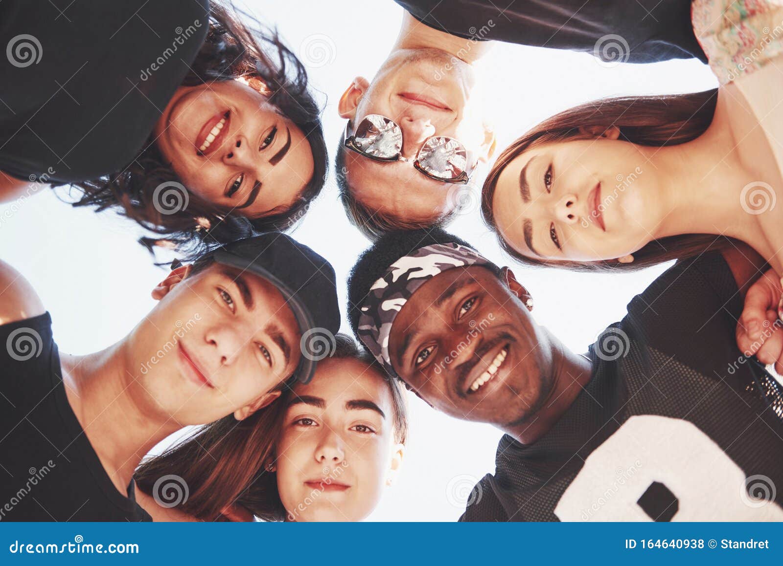 A Group of Happy Friends in the Photo Circle Below. Stock Photo - Image ...