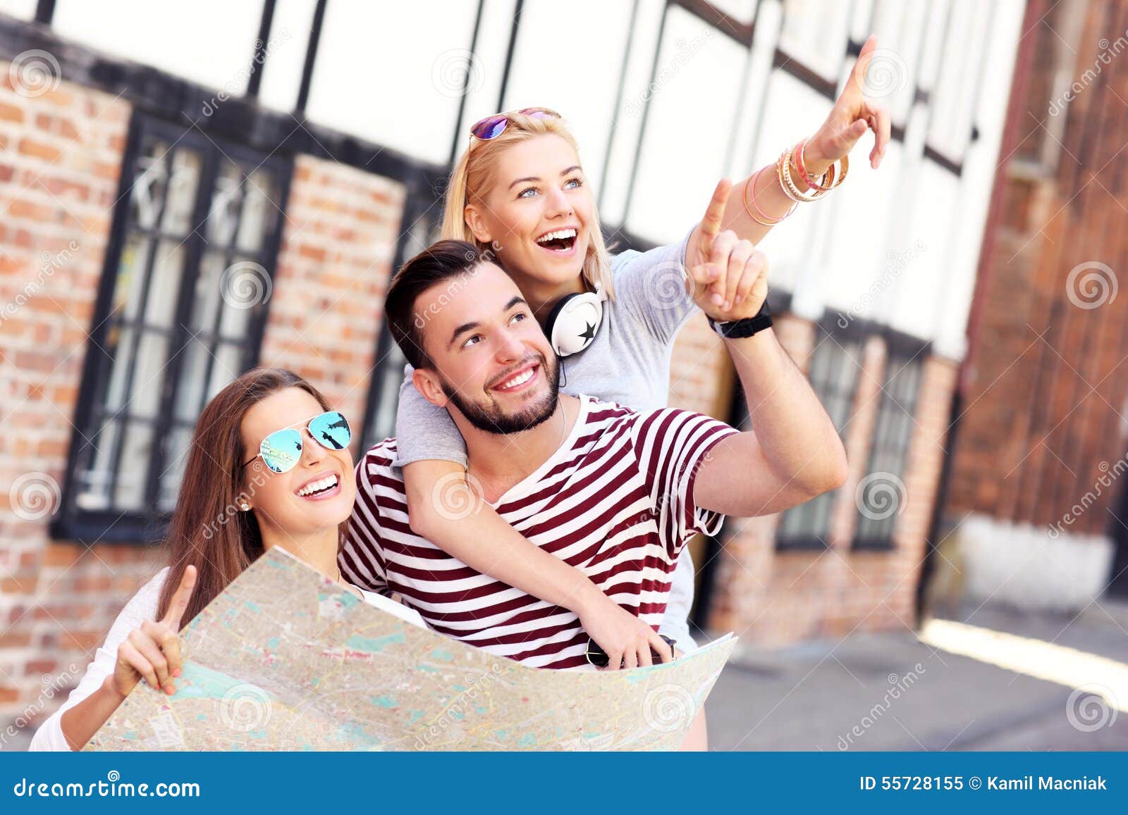 Group of Happy Friends Sightseeing with Map Stock Image - Image of ...