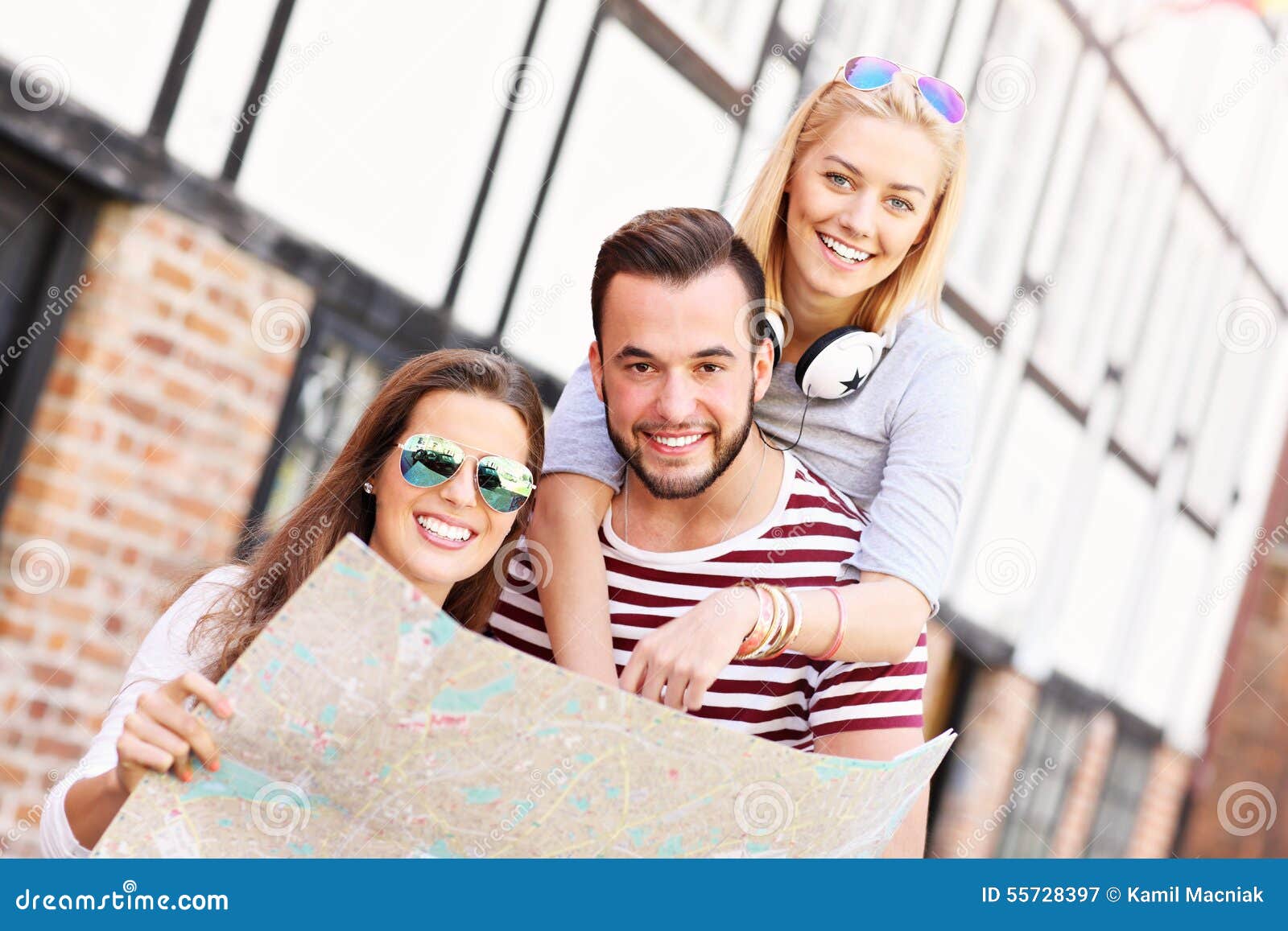 Group of Happy Friends Sightseeing with Map Stock Image - Image of ...