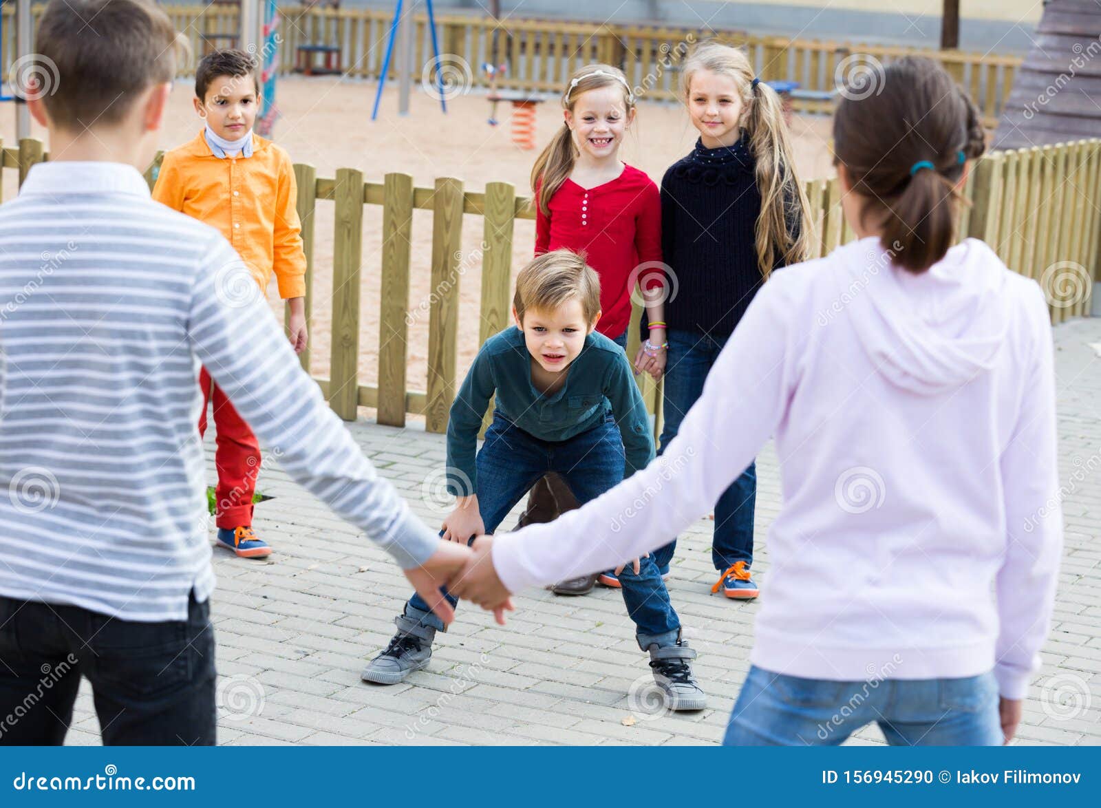 Group of Happy Glad Children Playing Red Rover Stock Photo - Image of ...