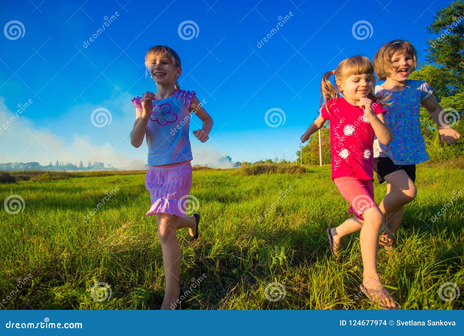 Group of Happy Kids Running in Summer Field Stock Photo - Image of ... Group of Happy Kids Running in Summer Field Stock Photo - Image of ...