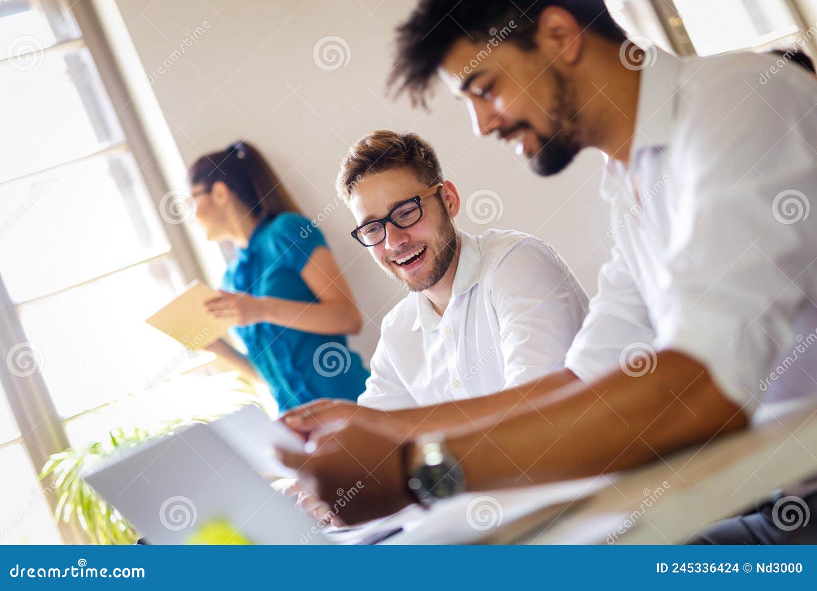 Group of Happy Multiethnic Business People Cooperating, Working on ... Group of Happy Multiethnic Business People Cooperating, Working on ...