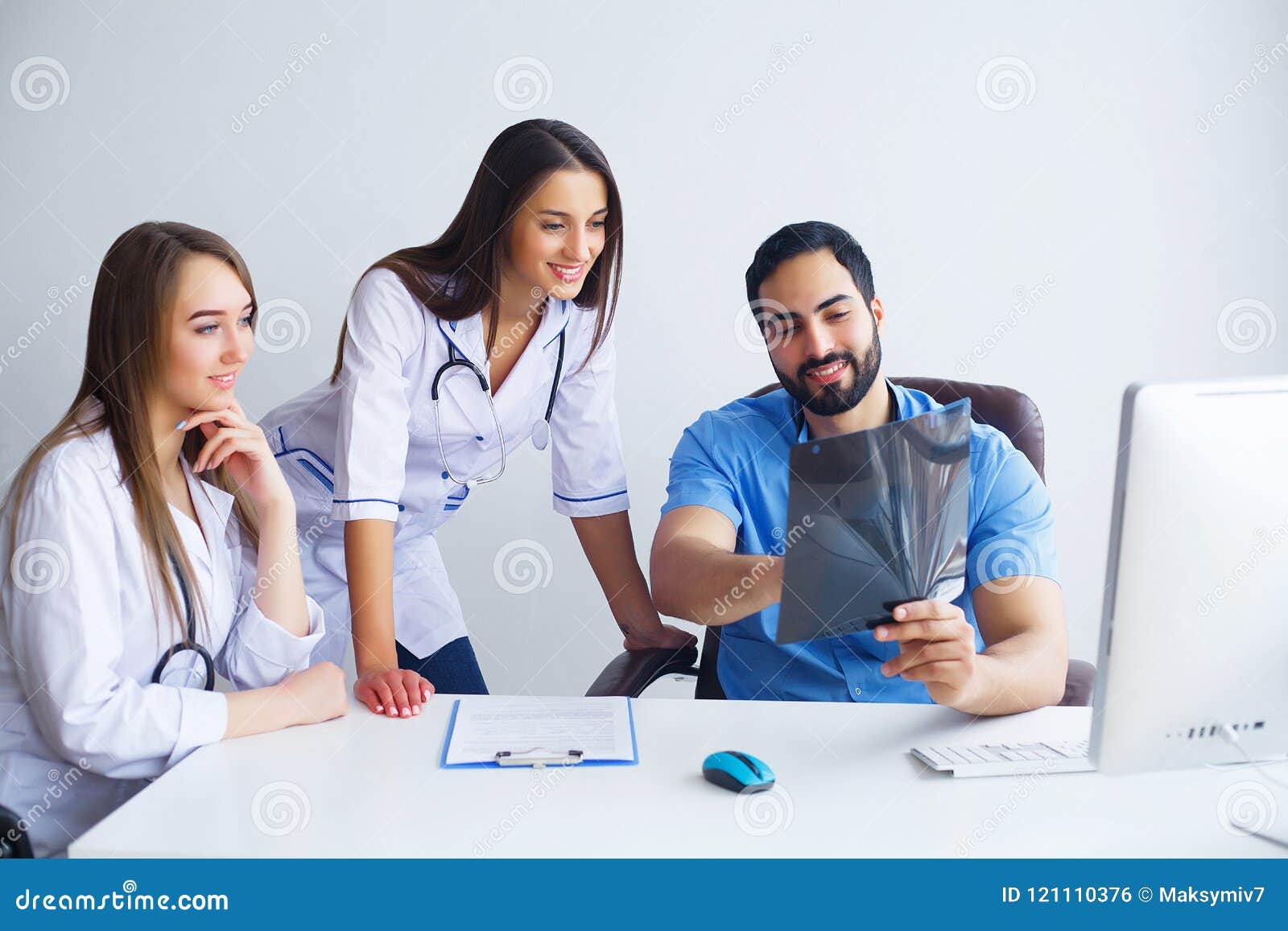 Group of Happy Multiracial Doctors Working Together in Clinic Stock ...