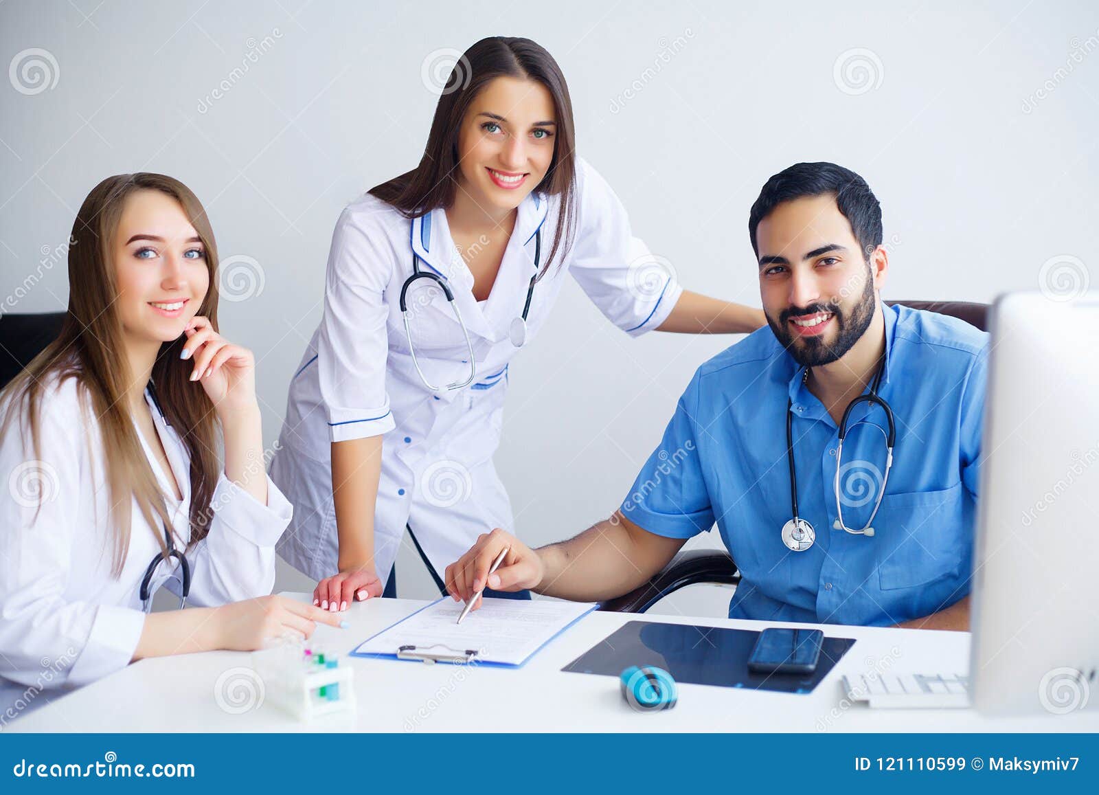 Group of Happy Multiracial Doctors Working Together in Clinic Stock ...