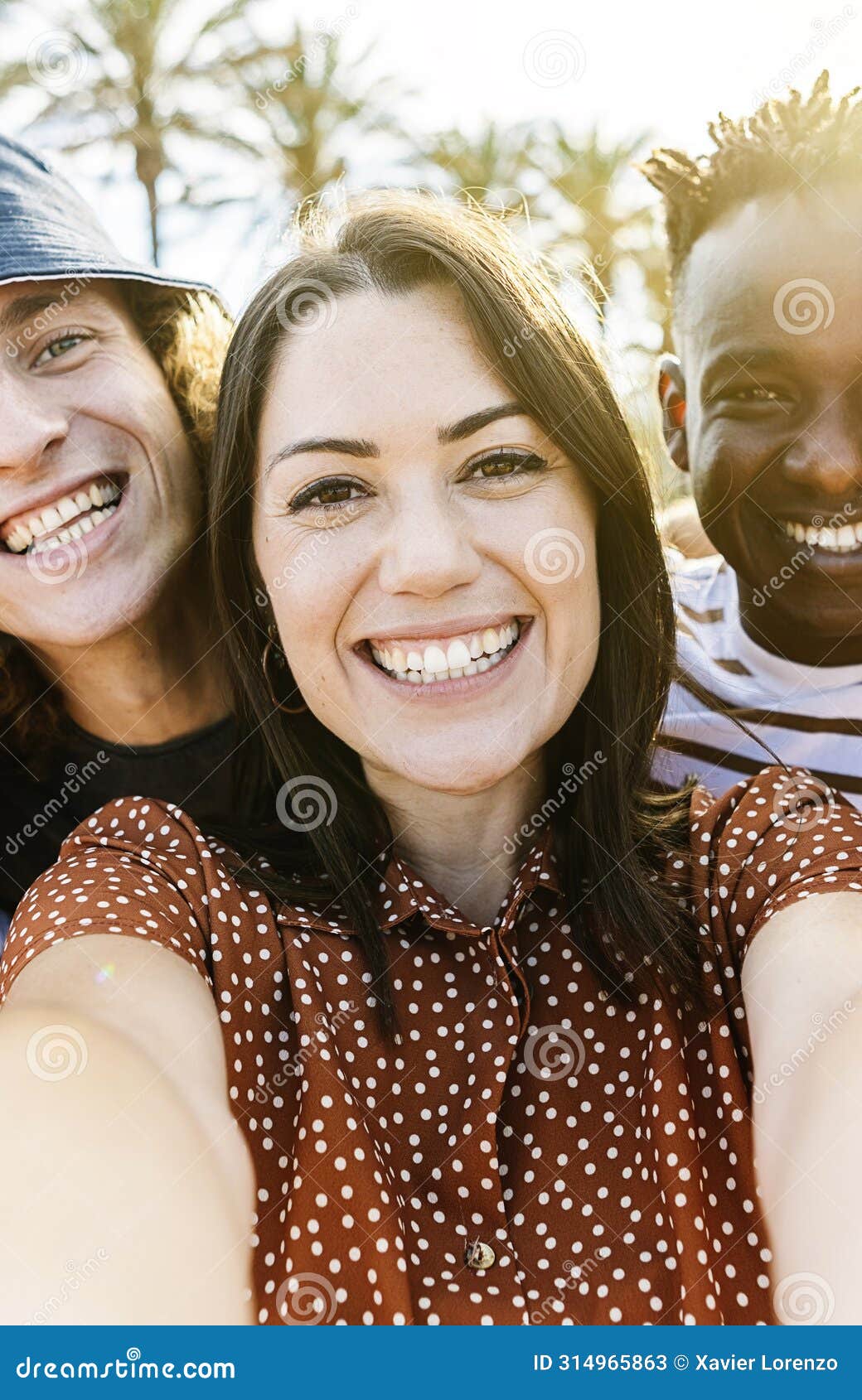 Group Of Happy Multiracial People Taking A Selfie With Mobile Phone