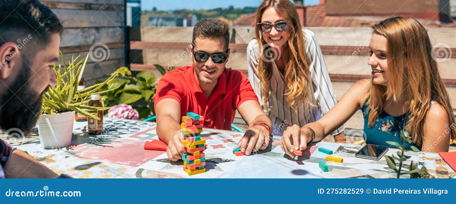 Group of Office Workers Playing with Jenga Game on Terrace Stock Image ...