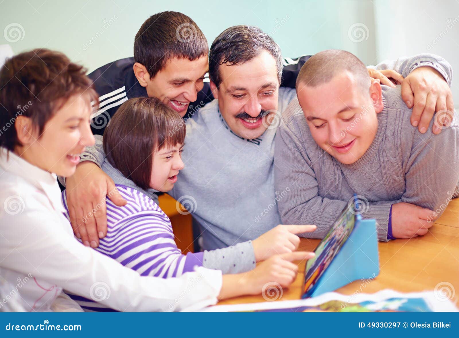 Group of Happy People with Disability Having Fun with Tablet Stock ...