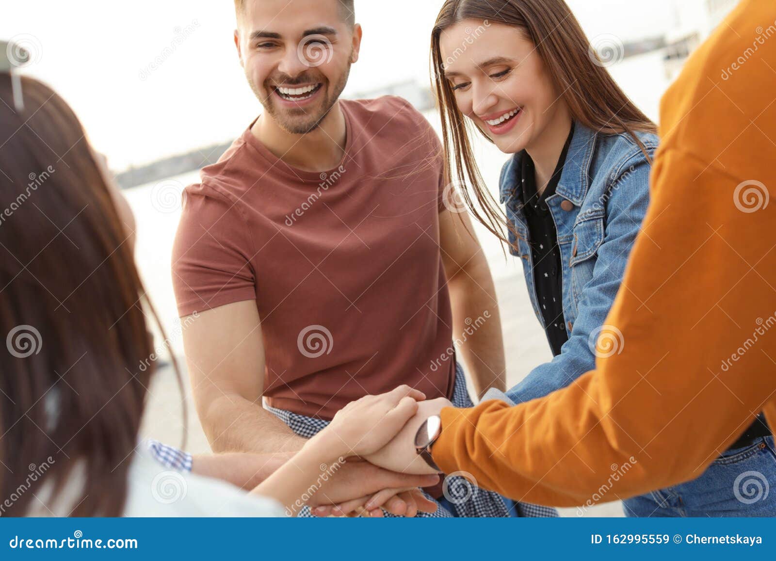 Group of Happy People Holding Hands Together Stock Image - Image of ...