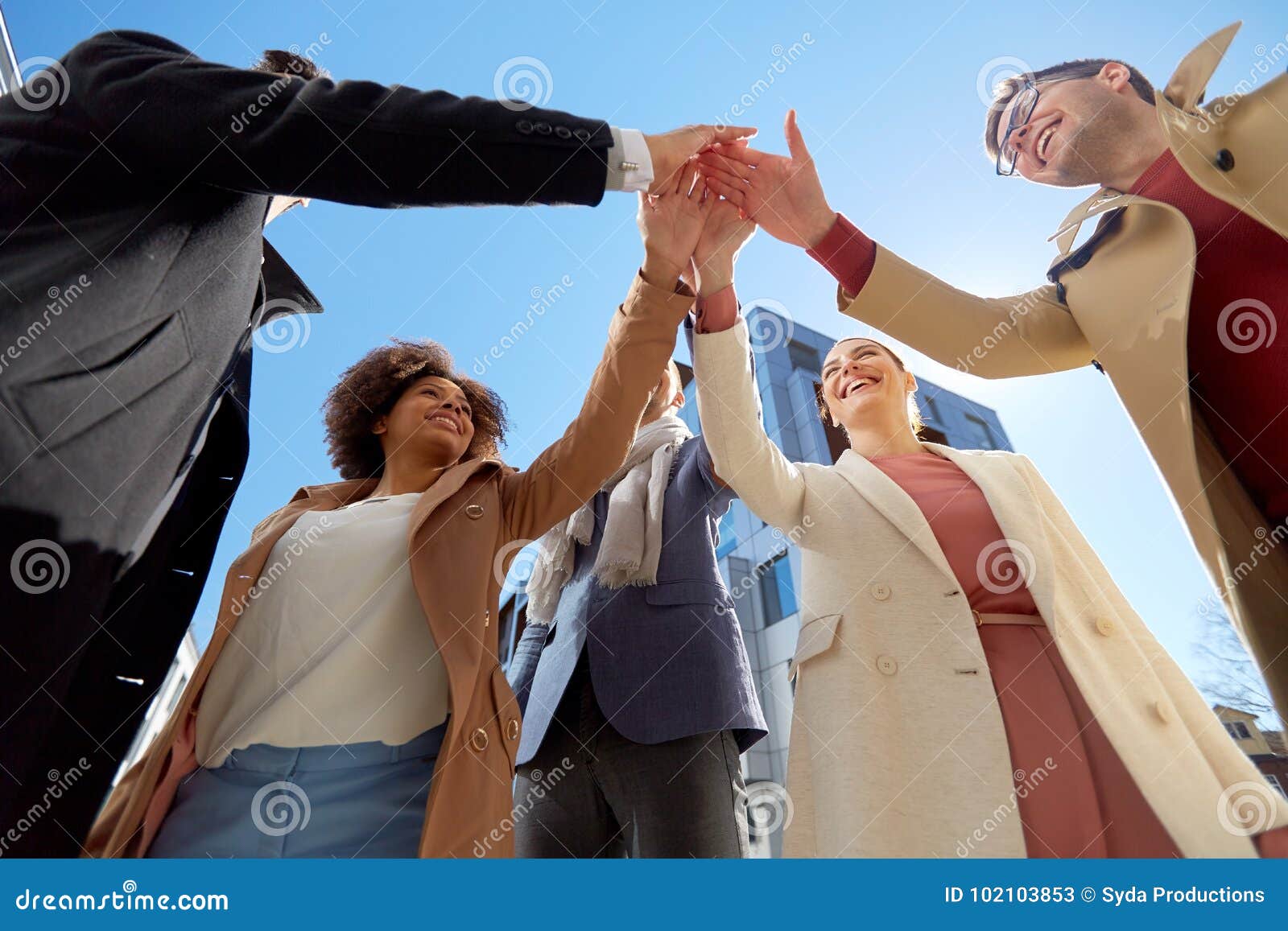 Group of Happy People Making High Five in City Stock Image - Image of ... Group of Happy People Making High Five in City Stock Image - Image of ...
