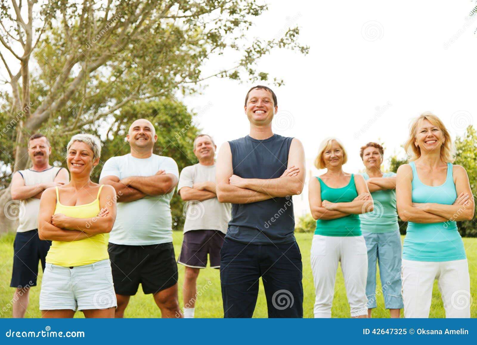 Group of Happy People Outside Stock Image - Image of green, gesturing ...