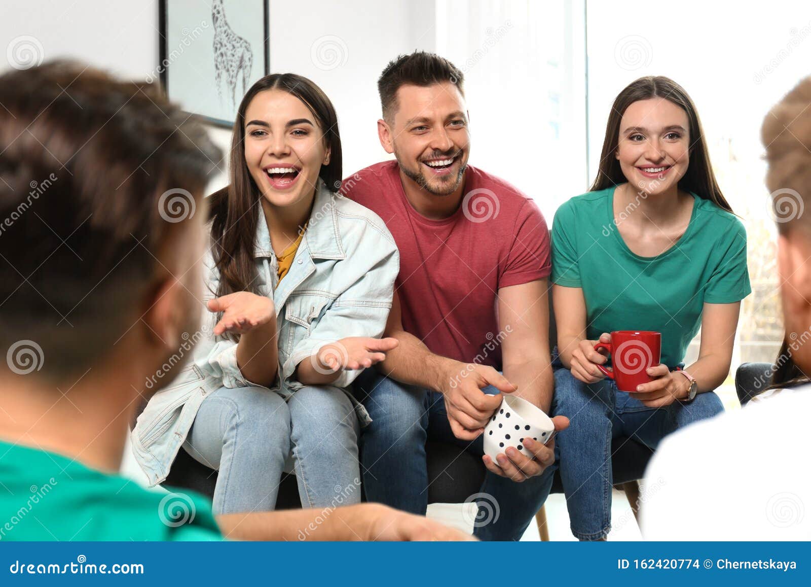 Group of Happy People Talking in Room Stock Photo - Image of leisure ...
