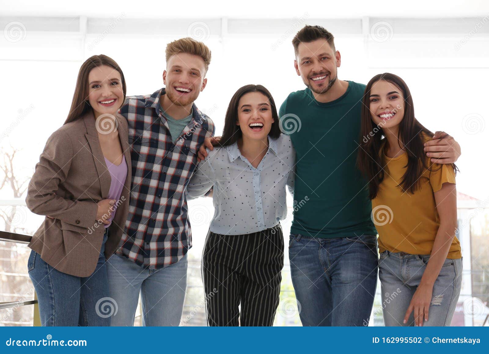 Group of Happy People Together in Room Stock Photo - Image of girl ...