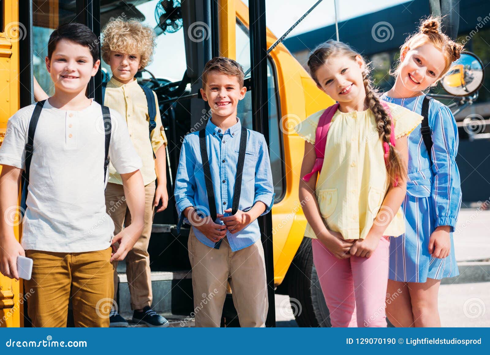Group of Happy Pupils Looking at Camera in Front of Stock Photo - Image ...