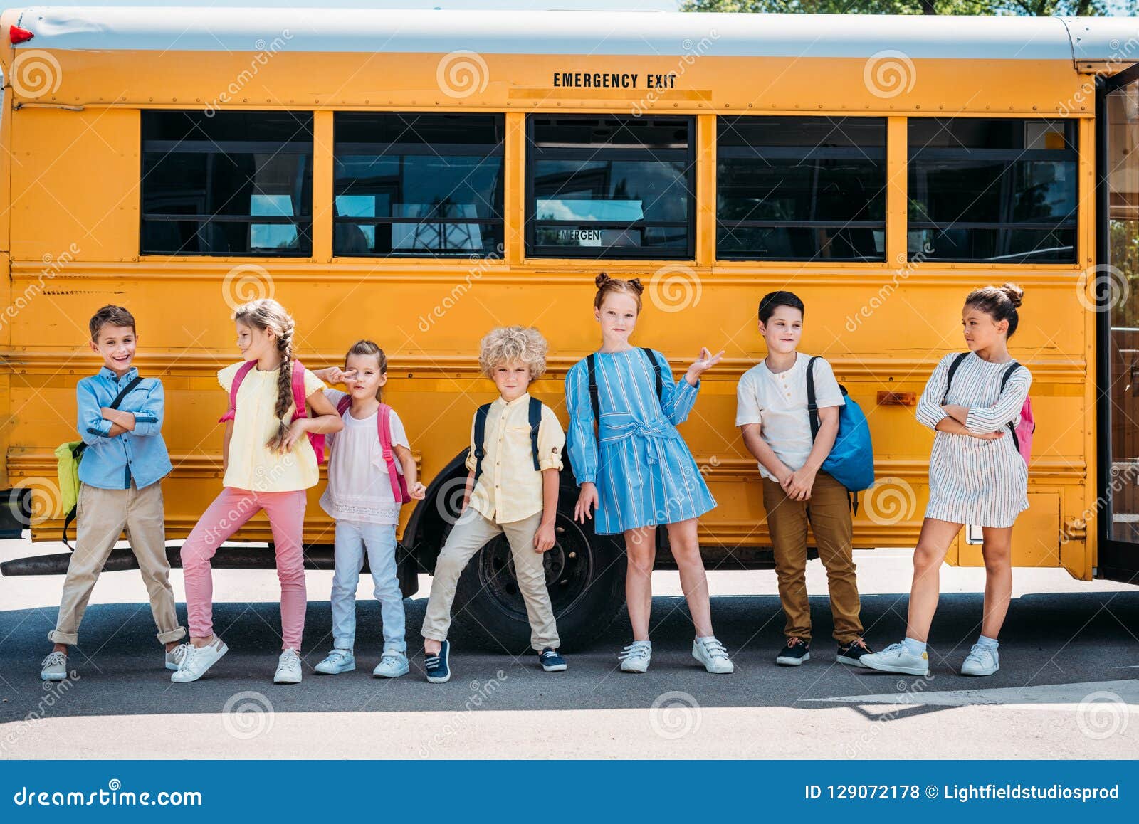 Group of Happy Pupils Posing in Front of Stock Photo - Image of posing ...