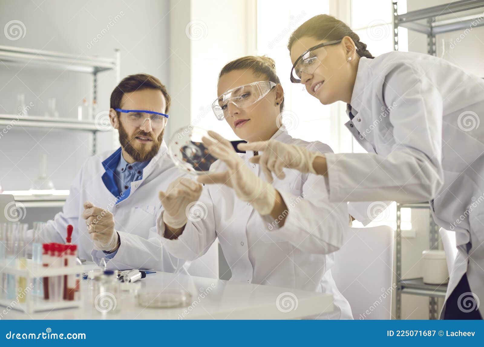 Group of Happy Scientists Doing Microbiological Research in Modern ...